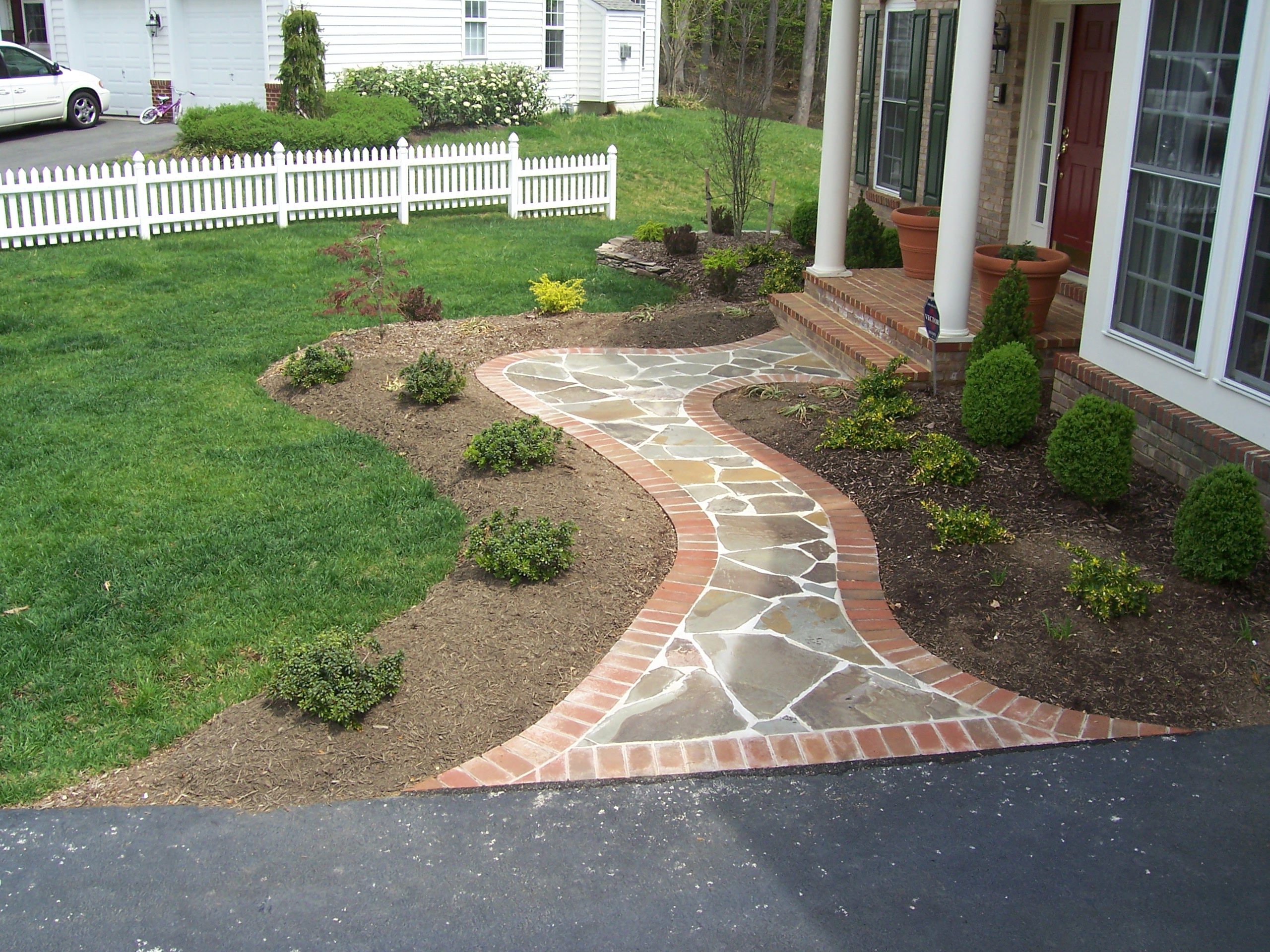 Red brick border with flares - Deming Lawn and Landscape